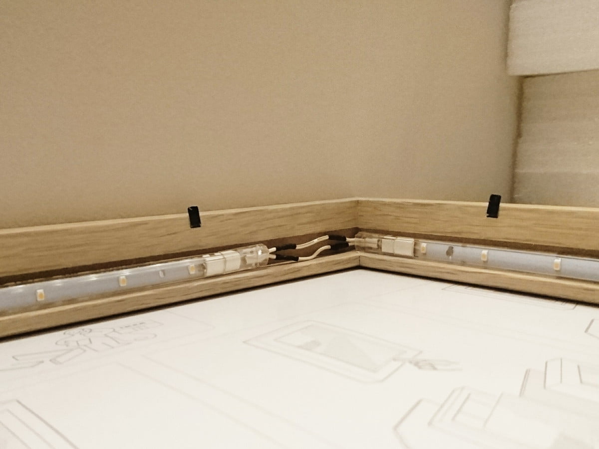 How to add light to poorly lit bathroom vanity mirror