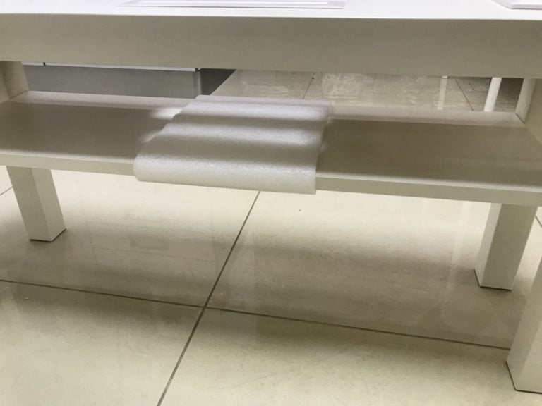 Multi-device charging station built into an IKEA bench